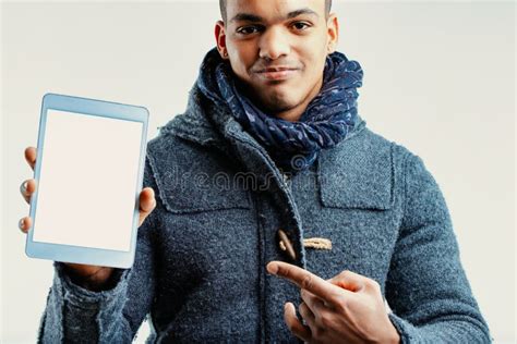 A Man Shows The Empty Screen For Your Copyspace On His Tablet W Stock Image Image Of