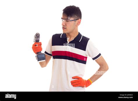 Young Arrogant Man With Black Hair In White And Blue T Shirt With