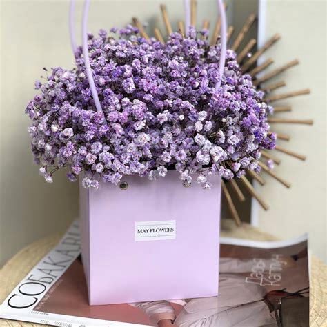 Коробка с цветами «Сумочка с гипсофилой заказать и купить за 2 650 ₽ с доставкой в Нижнем
