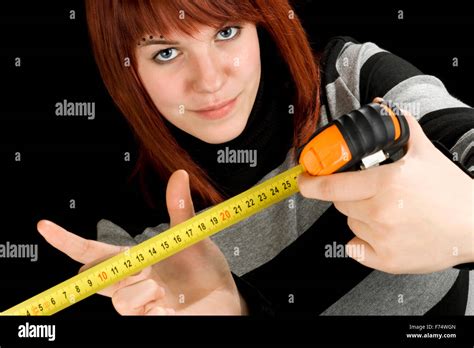 Girl Using A Measuring Tape Tool Stock Photo Alamy