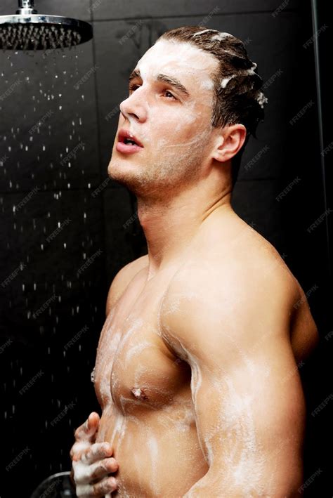 Premium Photo Shirtless Man Taking Bath In Bathroom