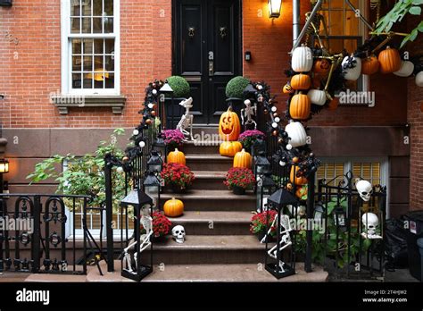 Beautiful Halloween Decorations Cover The Doorway And Staircase Of An