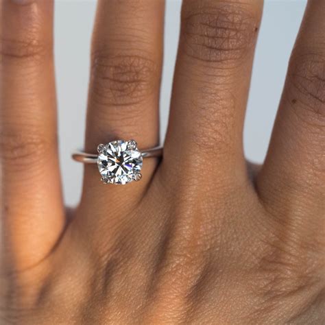 Round Brilliant Cut Solitaire Diamond Engagement Ring With Plain Band