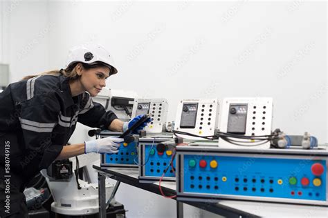 Female Engineer Control Autonomous Mobile Robot Or Amr In The