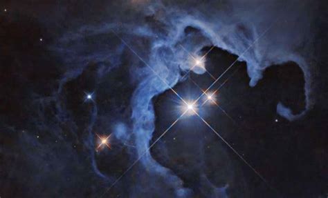 Nasas Hubble Captures Stunning Triple Star System 550 Light Years Away