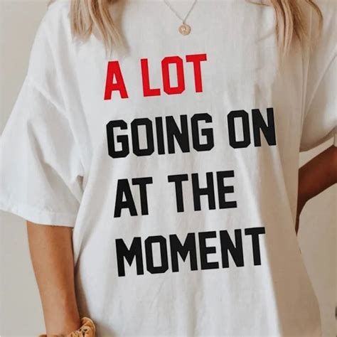 Tops Taylor Swift White Tee A Lot Going On At The Moment Poshmark