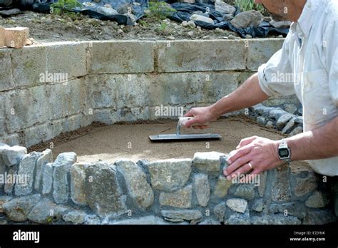 Earth Cob Clay Oven Project The Dry Stone Wall Base Has Been Topped