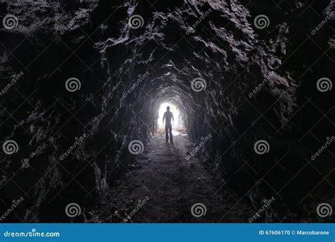Man Explores A Cave Stock Photo Image Of Human Geology 67606170