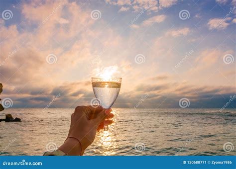 Girl Holding A Glass With Wine During The Sunset Stock Image Image Of