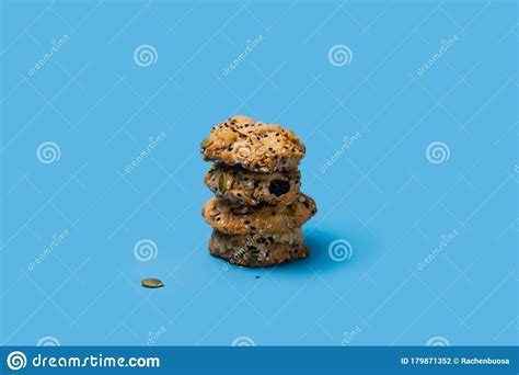 Cereal Chocolate Cookies And Milk In A Glass On A Blue Background