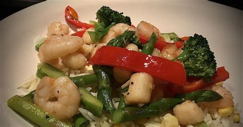 Sauté de pétoncles crevettes aux légumes au gingembre et citron