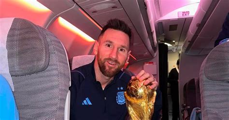Lionel Messi And Argentina Stars Travel Home With World Cup To Eagerly