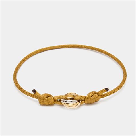 Cartier Trinity 18k Three Tone Gold Adjustable Cord Bracelet Cartier