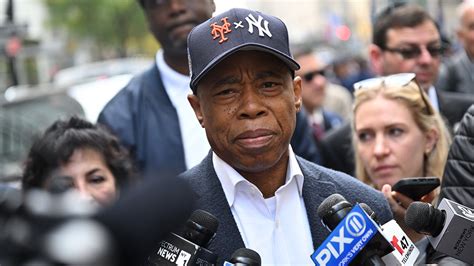 New York City Mayor Eric Adams Roasted For Wearing Both Yankees Mets
