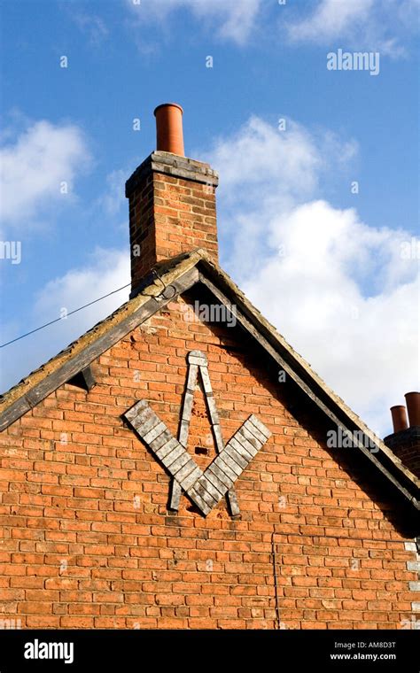 Square And Compass On The Side Of A Building In South Derbyshire