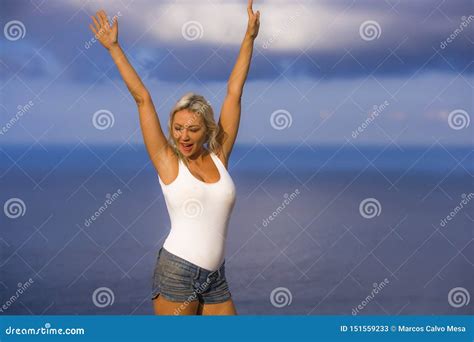 Young Attractive And Beautiful 30s Blond Hair Woman In Casual Top And