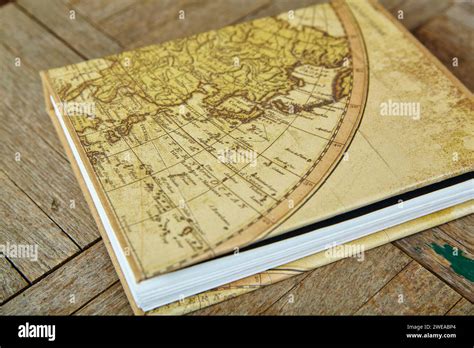 Vintage Eastern Hemisphere Map On Antique Book Cover Rustic Wooden