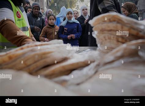 Turkish Charity Organisation Fetih Distributes Bread At The Yarmouk