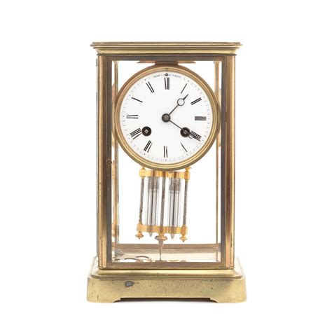 Bonhams An Early 20th French Brass Four Glass Mantel Clock The