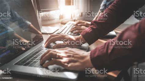 Development Programmer Writing A Code On Database Teamwork Cooperation