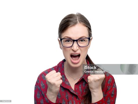 A Portrait Of Young Brunette Woman Screaming Loudly She Looking At