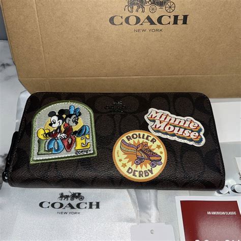 【未使用】1円スタート 新品未使用品 Coach ディズニーコラボ ミッキーパッチ 長財布 ブラック の落札情報詳細 ヤフオク落札価格情報