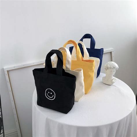 업타운걸스 캔버스 미니 스마일 에코 백 보조 가방 5 색상 핸드 폰 무지 가벼운 천 텀블러