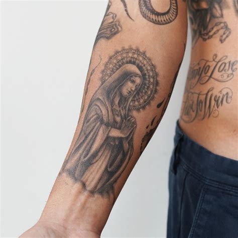 Virgin Mary Forearm Tattoo