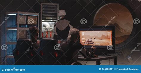 woman controlling mars rover with remote controller stock image image