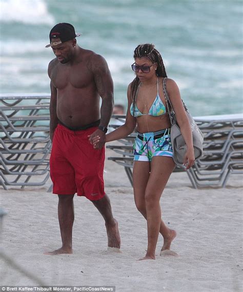 Empire S Taraji P Henson Shows Off Her Beach Body With NFL S Kelvin