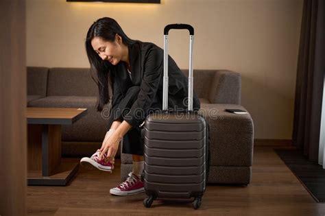 Woman Takes Off Her Shoes In A Hotel Stock Image Image Of Young