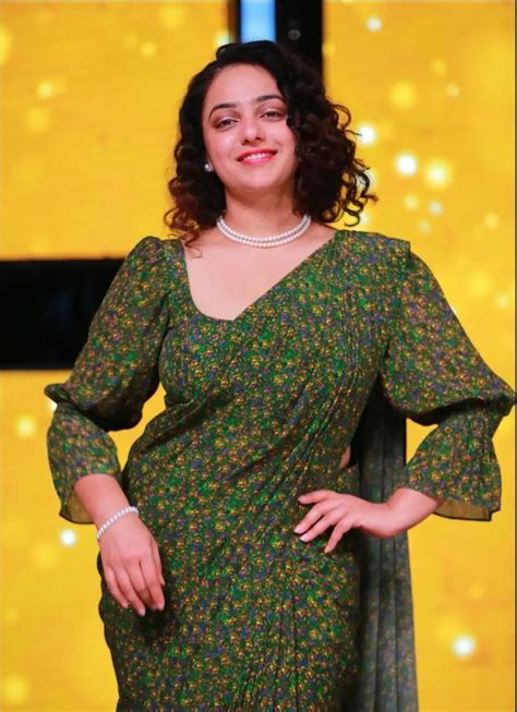 Nithya Menen Looks Strikingly Beautiful In A Green Floral Saree For