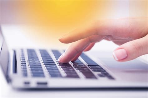 Premium Photo Womans Hand Typing On Computer Keyboard