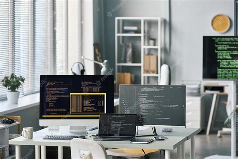 Premium Photo Programming Code On Multiple Screens In Office Of It
