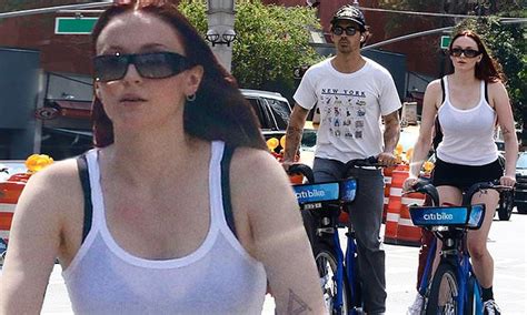Sophie Turner Flashes Bra Beneath Sheer Tank Top During Nyc Bike Ride