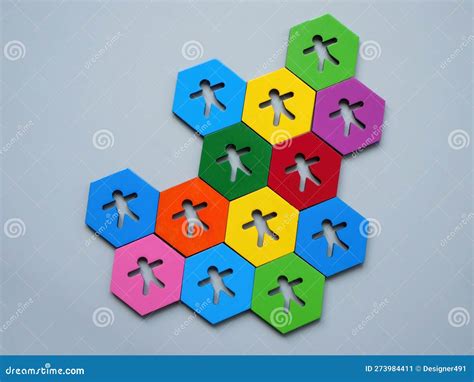 Multi Colored Hexagons With Figures As A Symbol Of Unity And Teambuilding Stock Image Image