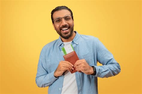 Premium Photo Man With Passport And Boarding Pass