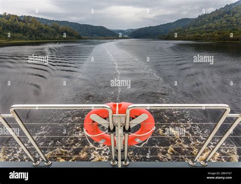 A View Across The Stainless Stern Railings And Orange Buoy Of A Gordon