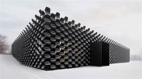 Chybik Kristof Uses 900 Plastic Chairs To Clad Czech Furniture Showroom