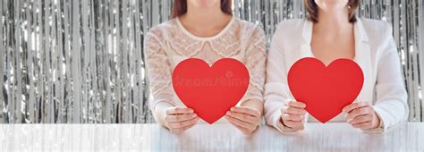 Close Up Of Lesbian Couple Hands With Wedding Ring Stock Image Image