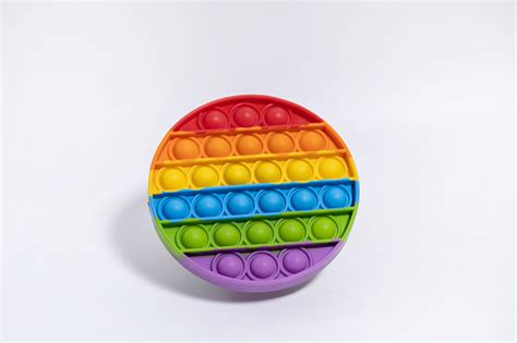 멀티 컬러 안티 스트레스 장난감 흰색 배경에 무지개 색상의 간단한 보조개 감각 지각에 대한 스톡 사진 및 기타 이미지 감각 지각 노랑 녹색 Istock