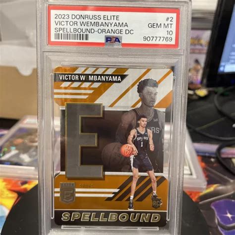 PSA VICTOR Wembanyama RC Donruss Elite Spellbound E Taglio Arancione EUR