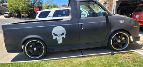 Bizarre Chevy Astro Van Customized With Camaro Front End