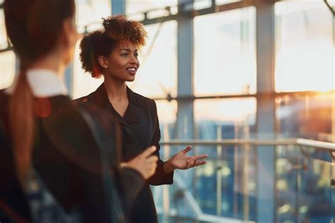 Shot Of A Young Businesswoman Delivering A Speech During A Conference