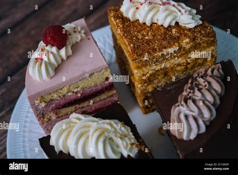Collection Of Various Cakes On Wood Background Assortment Of Pieces