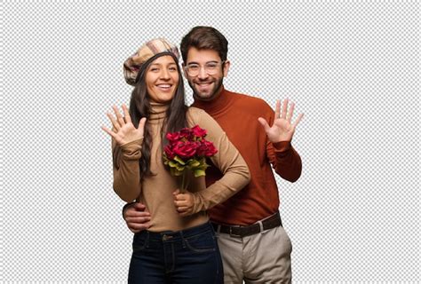 Premium Psd Young Couple In Valentines Day Showing Number Ten
