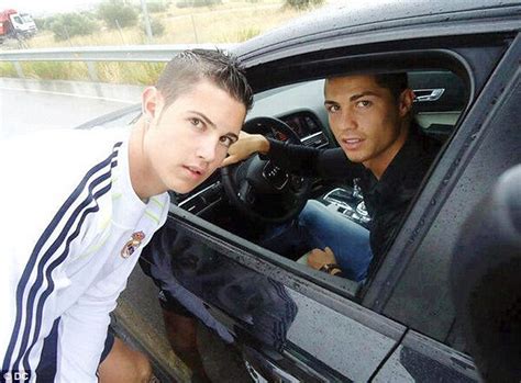 Cristiano Ronaldo Meets Fan Who Looks Just Like Him Daily Mail Online