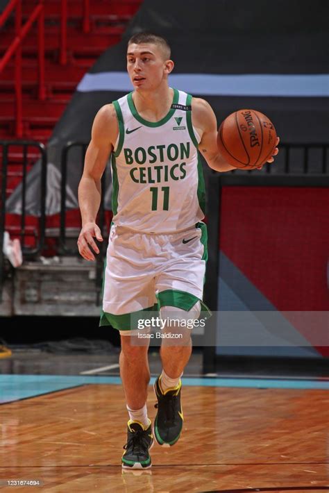 Payton Pritchard Of The Boston Celtics Dribbles During The Game In