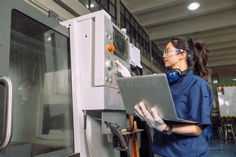 Engineer Women Working In Lathe Shop With Digital Cnc Metal Lathe