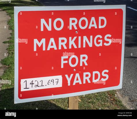 Road Sign Declares No Road Markings For Yards Excessive